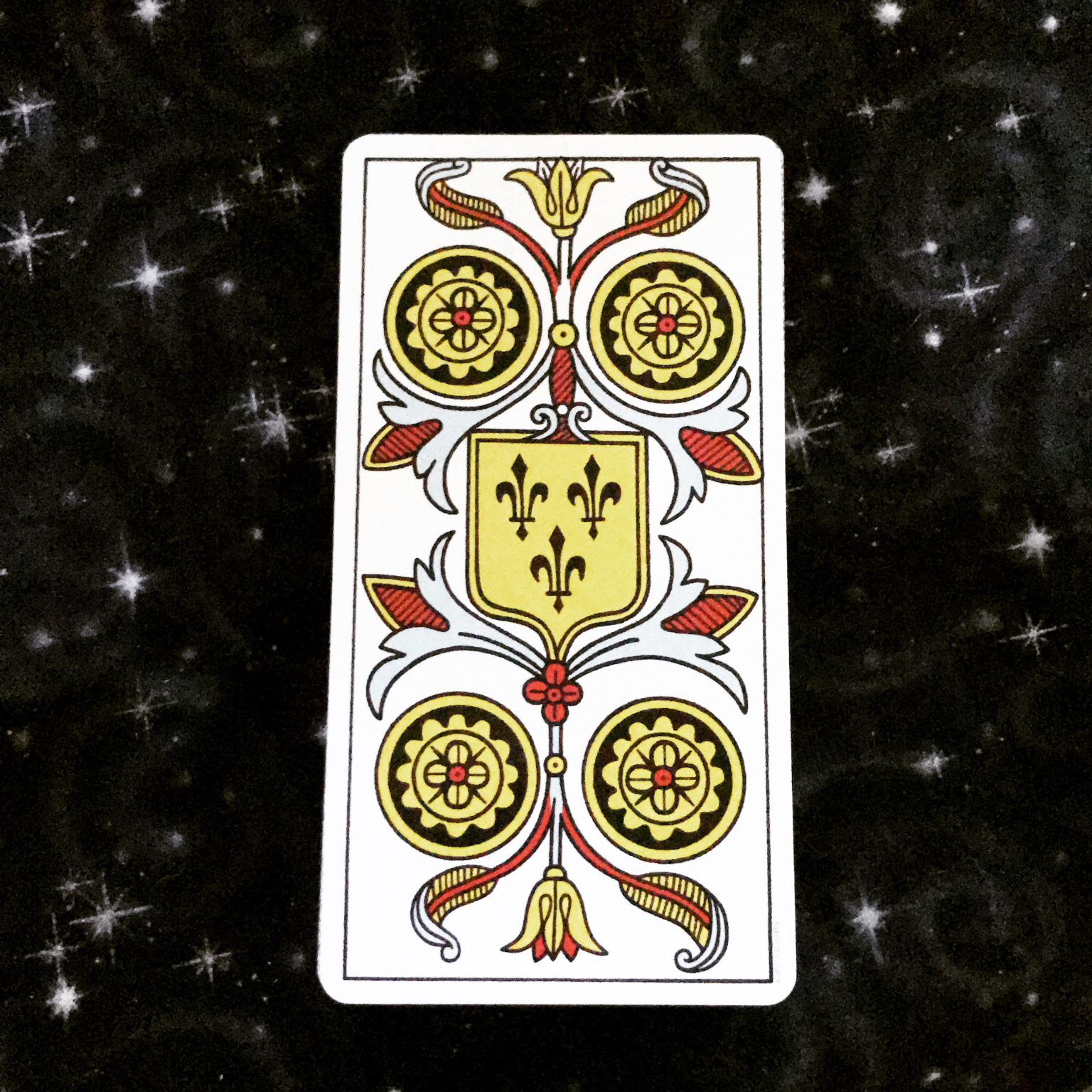 Four of Coins | Cards of Light